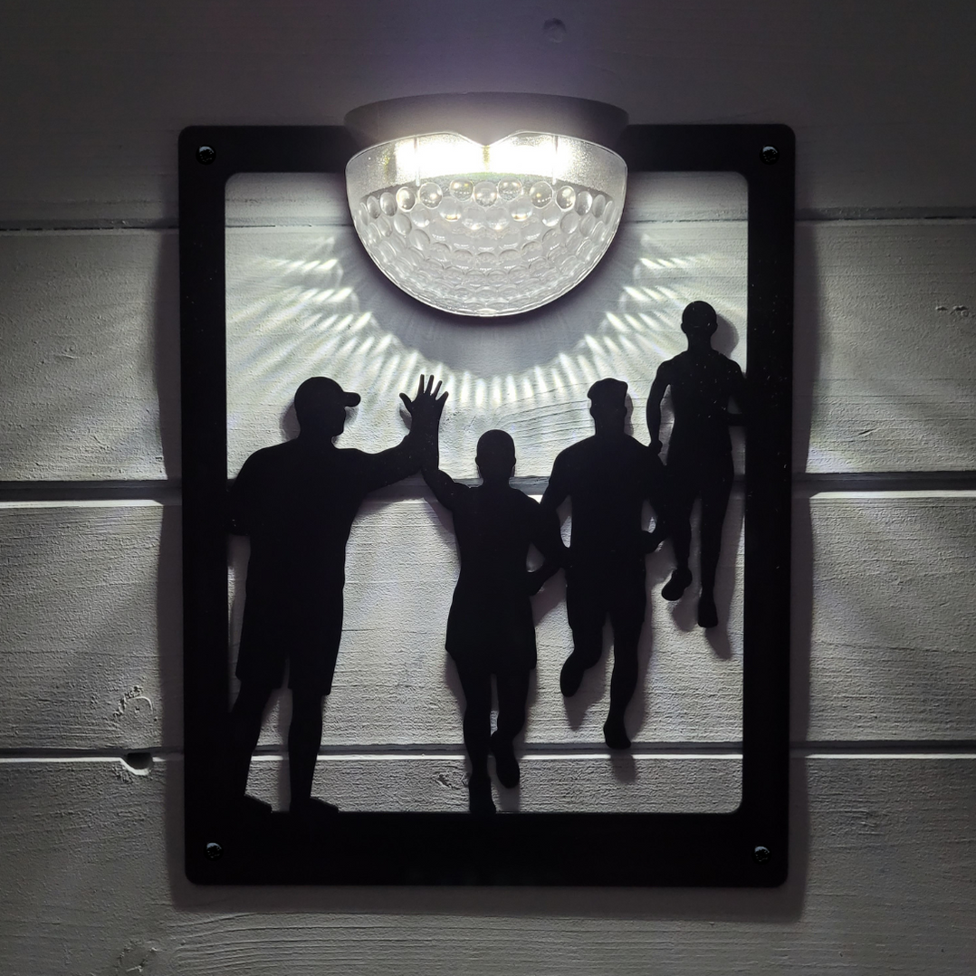Running Group Solar Light Wall Plaque — Flory's Online